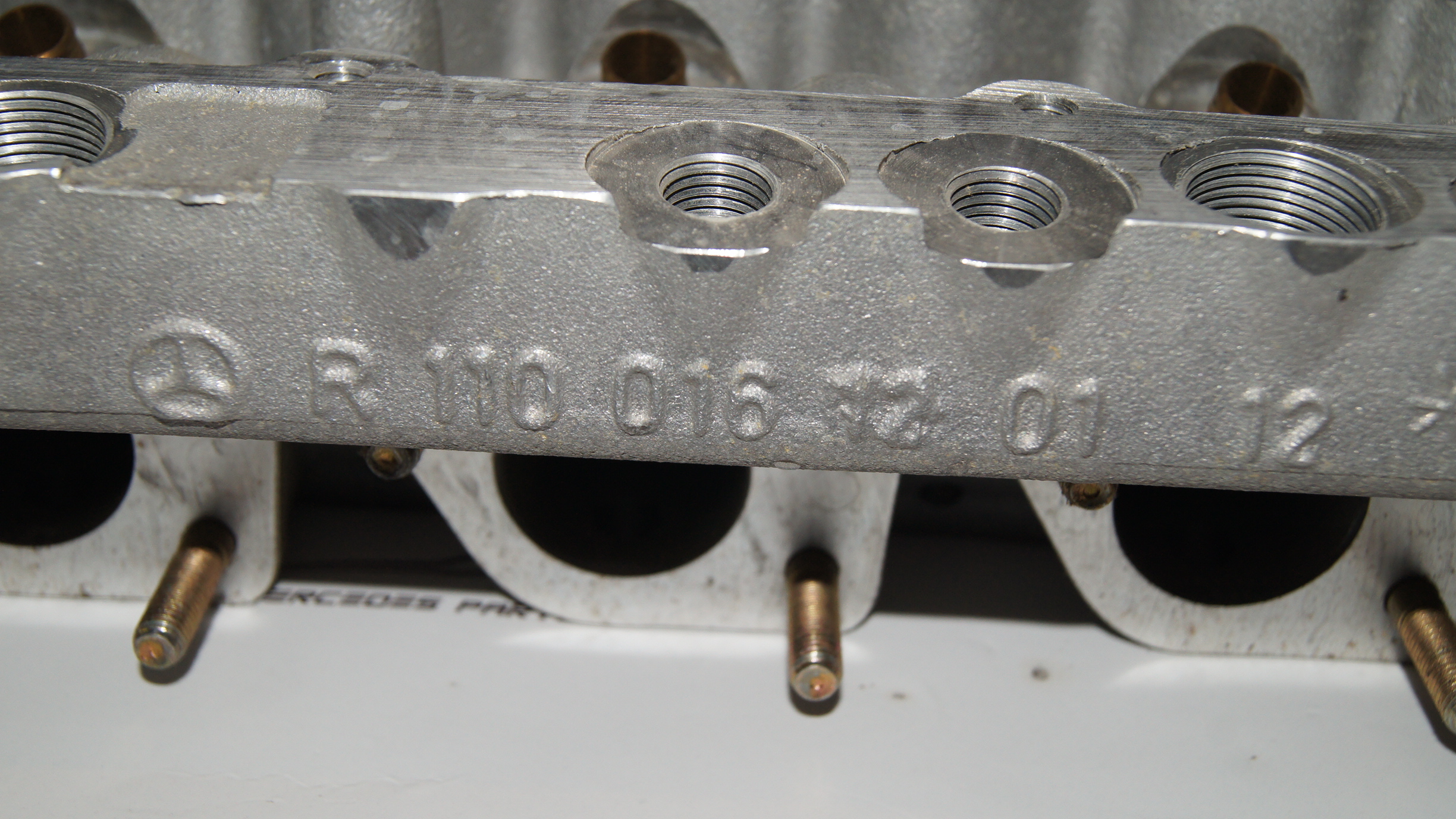 M110 cylinder head - mercedes partz