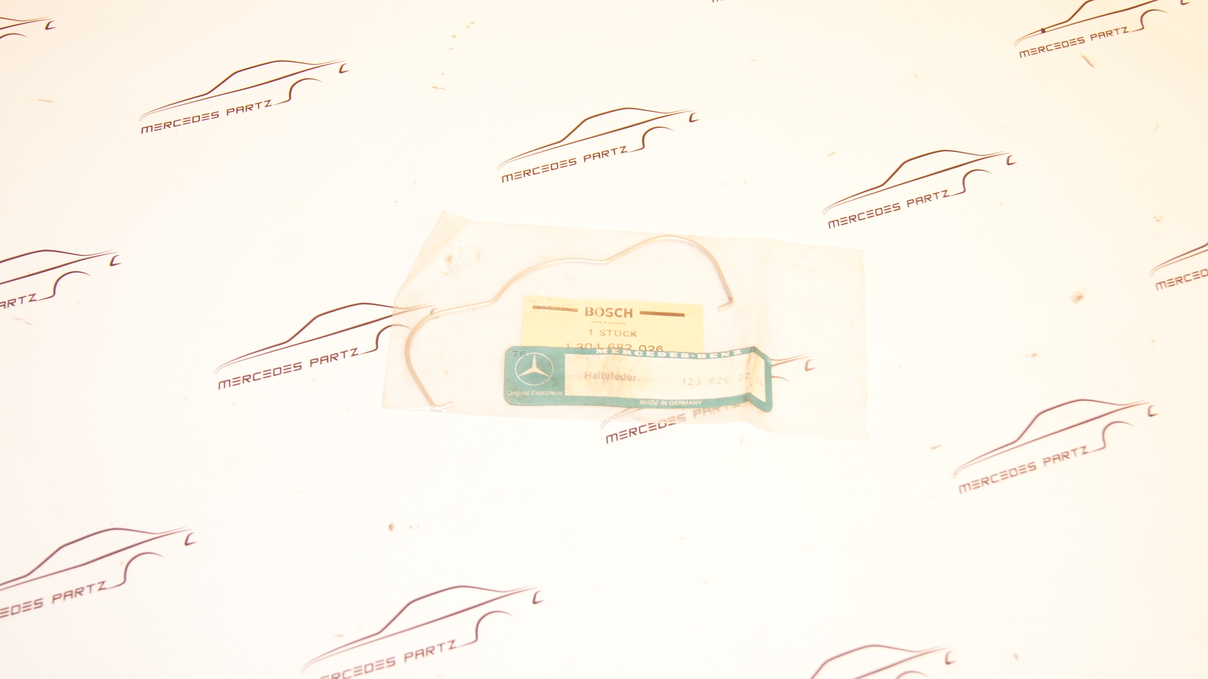 W123 headlight spring clip - mercedespartz