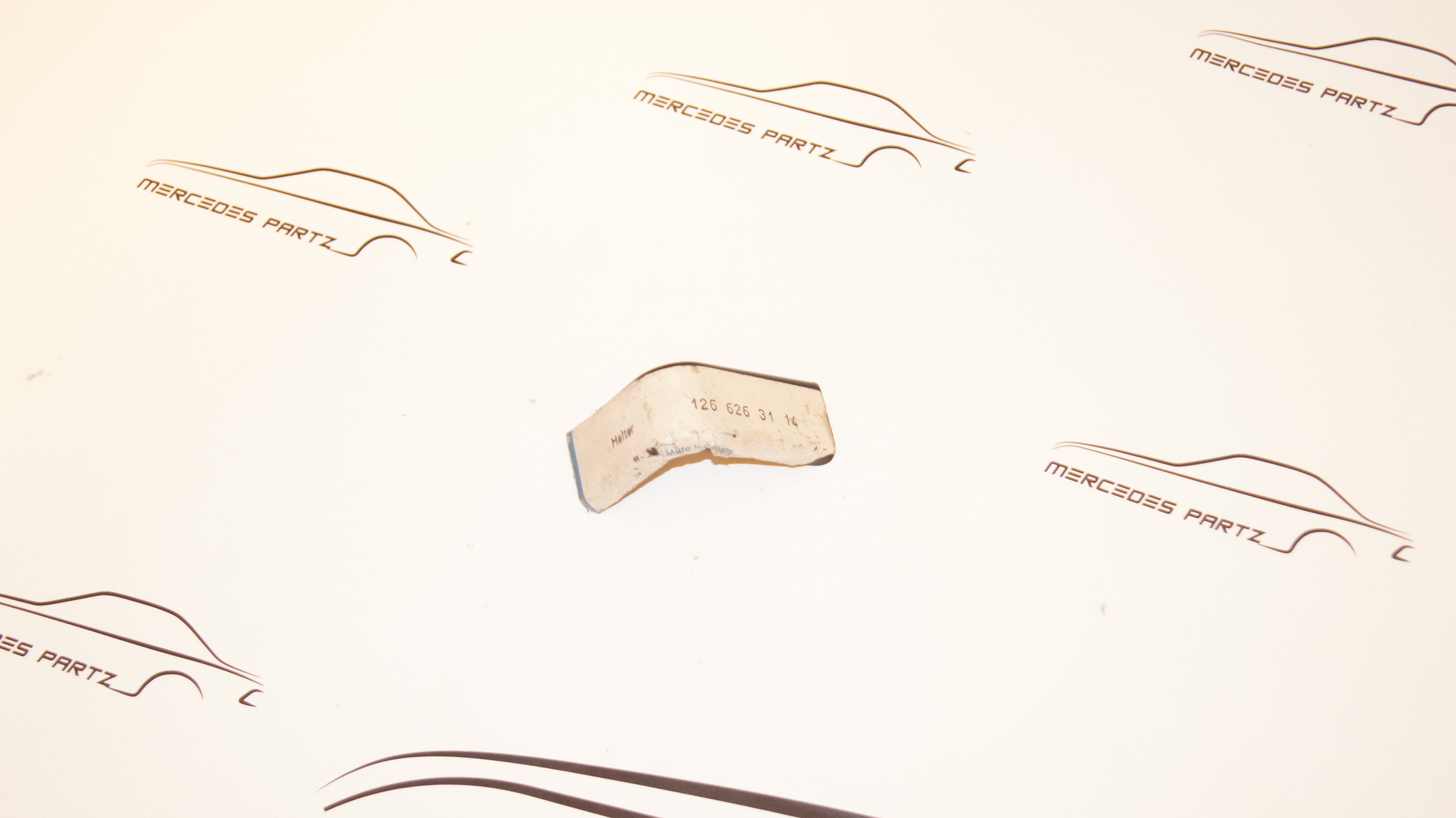 W126 front subframe wheelhouse liquid tank bracket - mercedespartz