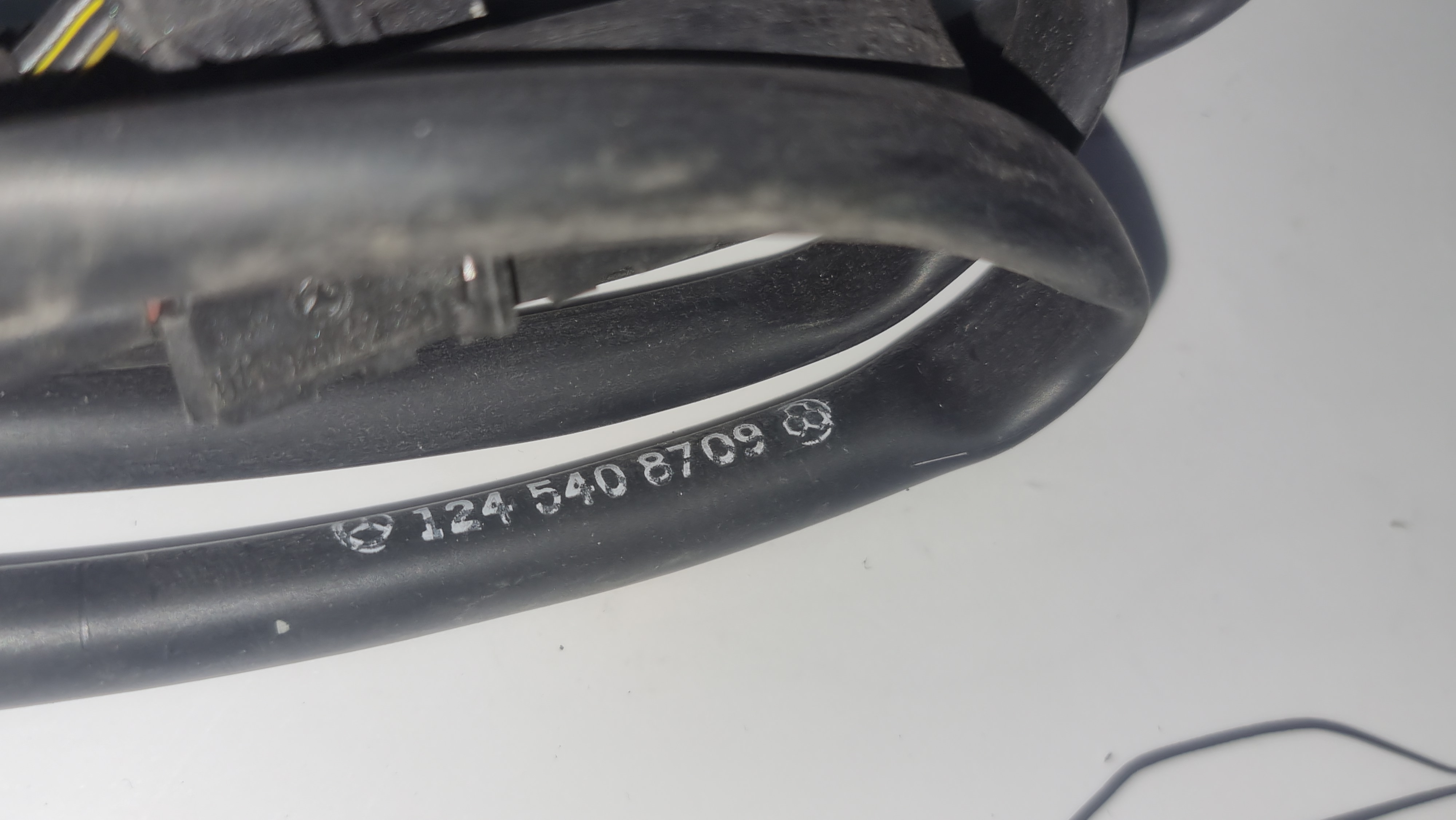 A1245408709 W124 C124 headrest unlocking mechanism NOS - mercedespartz