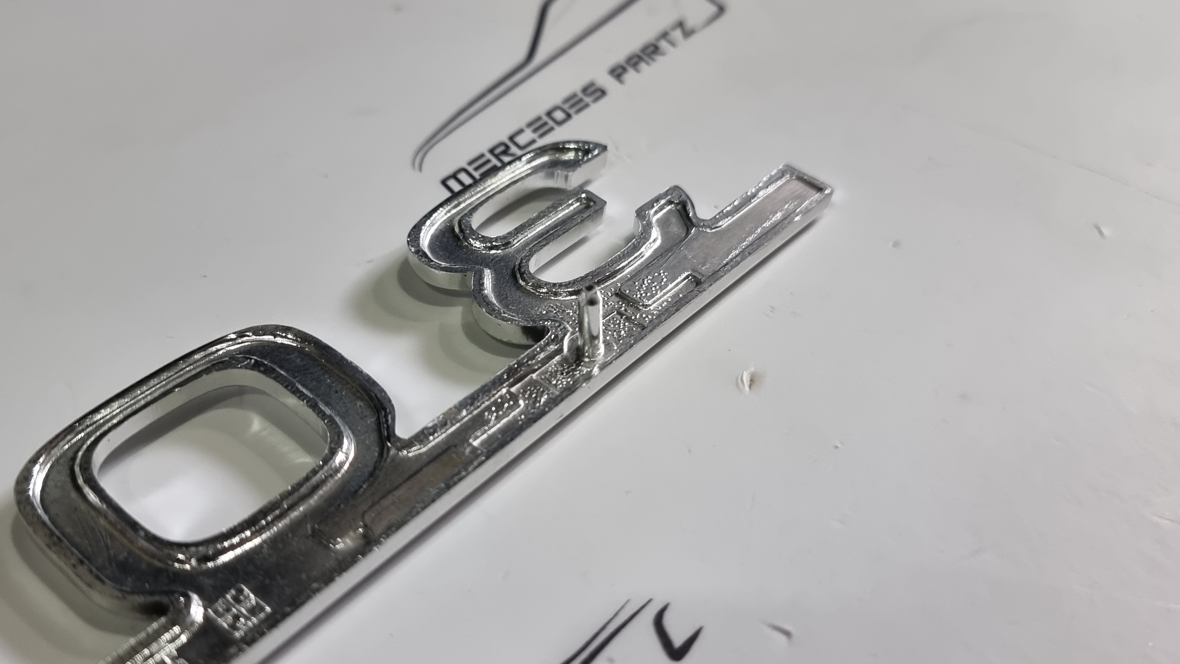 W123 300D trunk type designation emblem NOS A1238170915 - mercedespartz