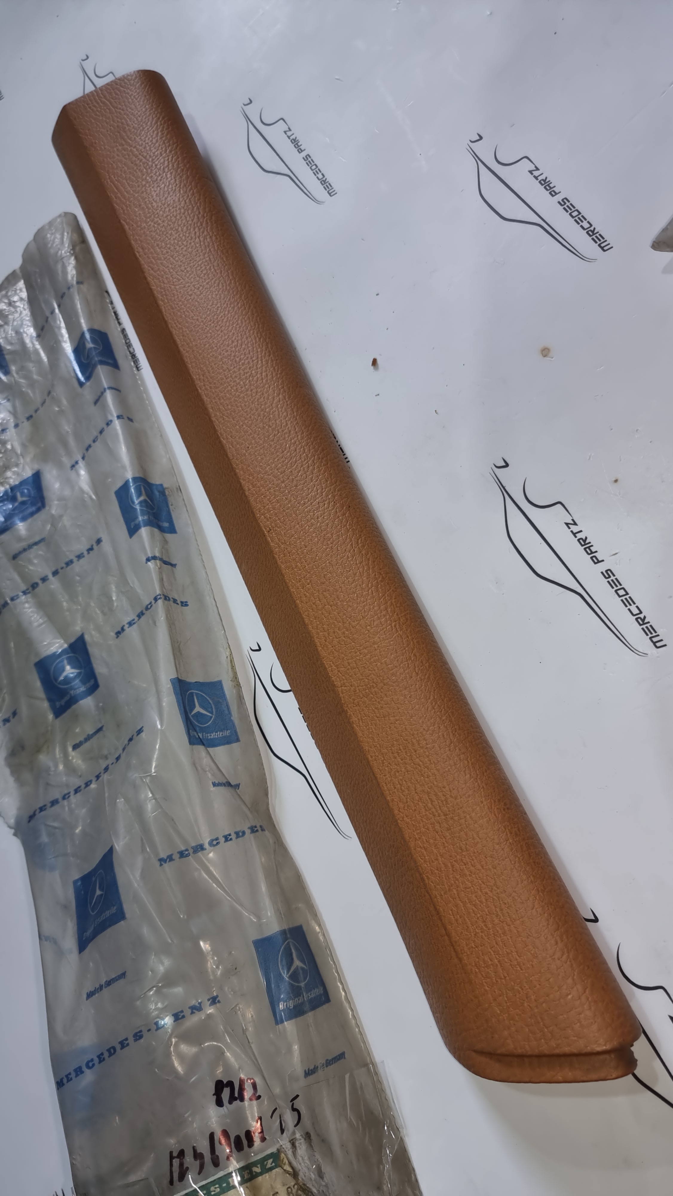 W123 left front cover paneling brown NOS A12369001258262 - mercedespartz