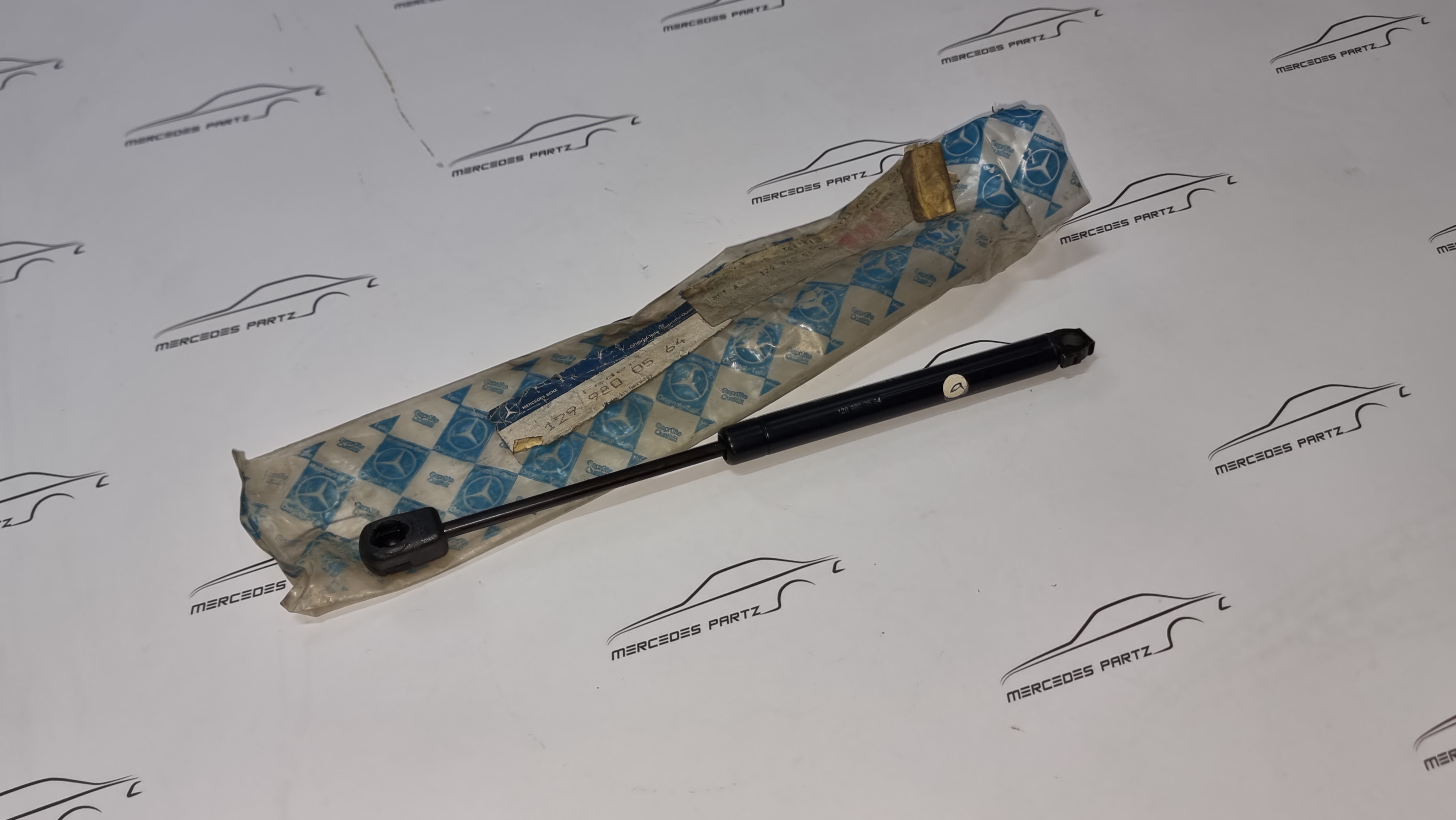 R129 trunk lid spring - mercedespartz