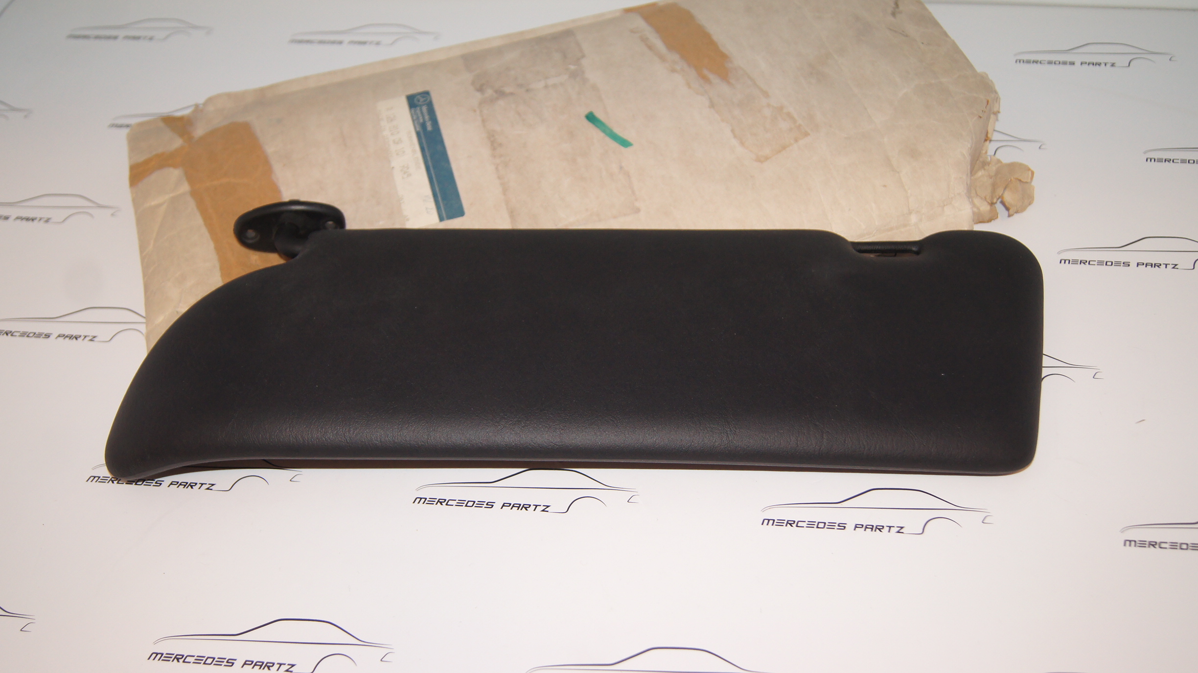 A1268100910 9045 , W126 left sunvisor less mirror NEW NOS - mercedespartz
